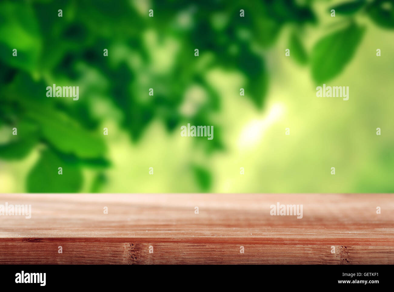 Tabletop on natural background Stock Photo - Alamy