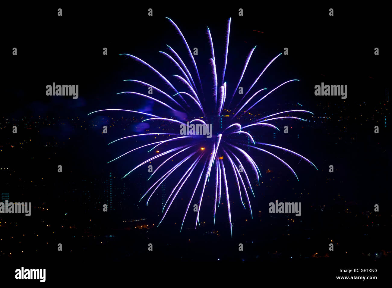 single blue fireworks burst with trails 1 Stock Photo - Alamy