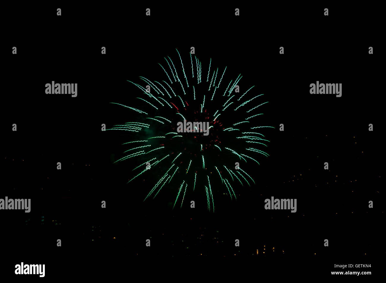 single green fireworks burst Stock Photo - Alamy