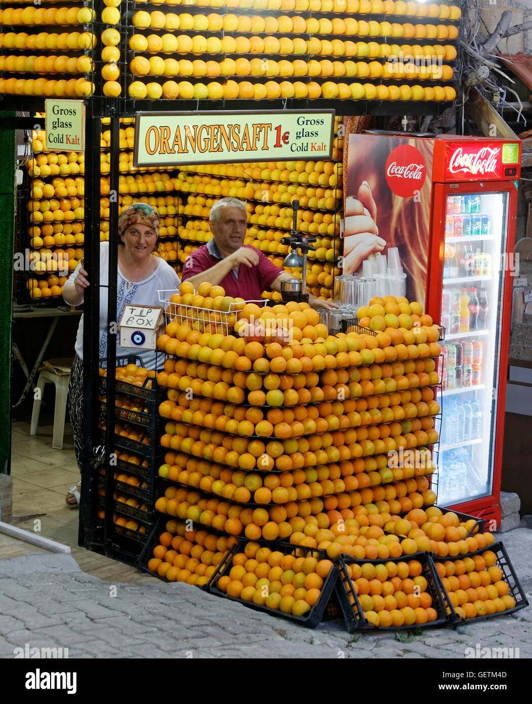 SIDE, TURKEY - JULY 4: Orange juice seller at Karanfil street on July 4 ...
