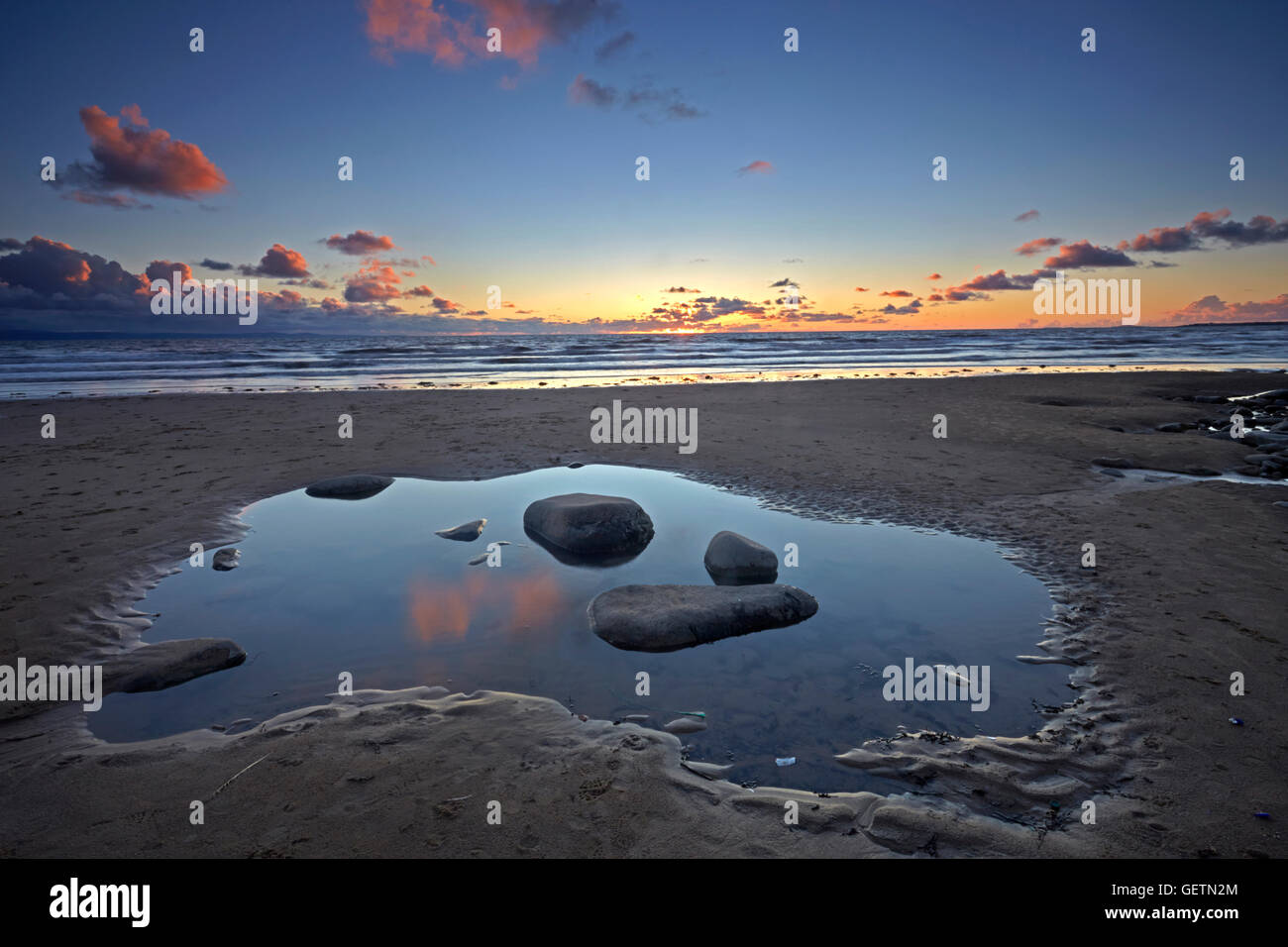 Sunset over tidal pool at Dunraven Bay Stock Photo - Alamy