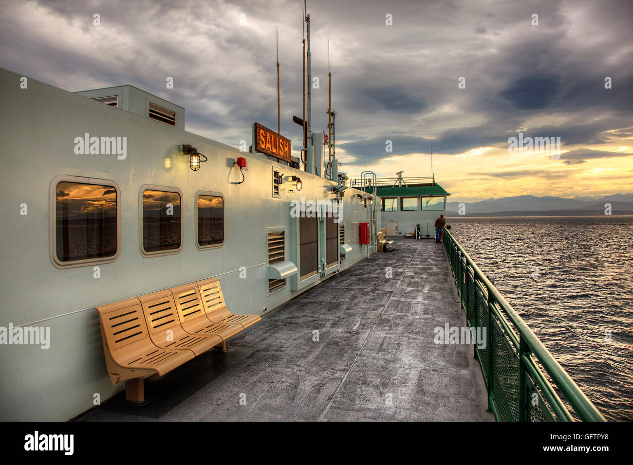 On the deck of a ferry boat at sunset Stock Photo - Alamy