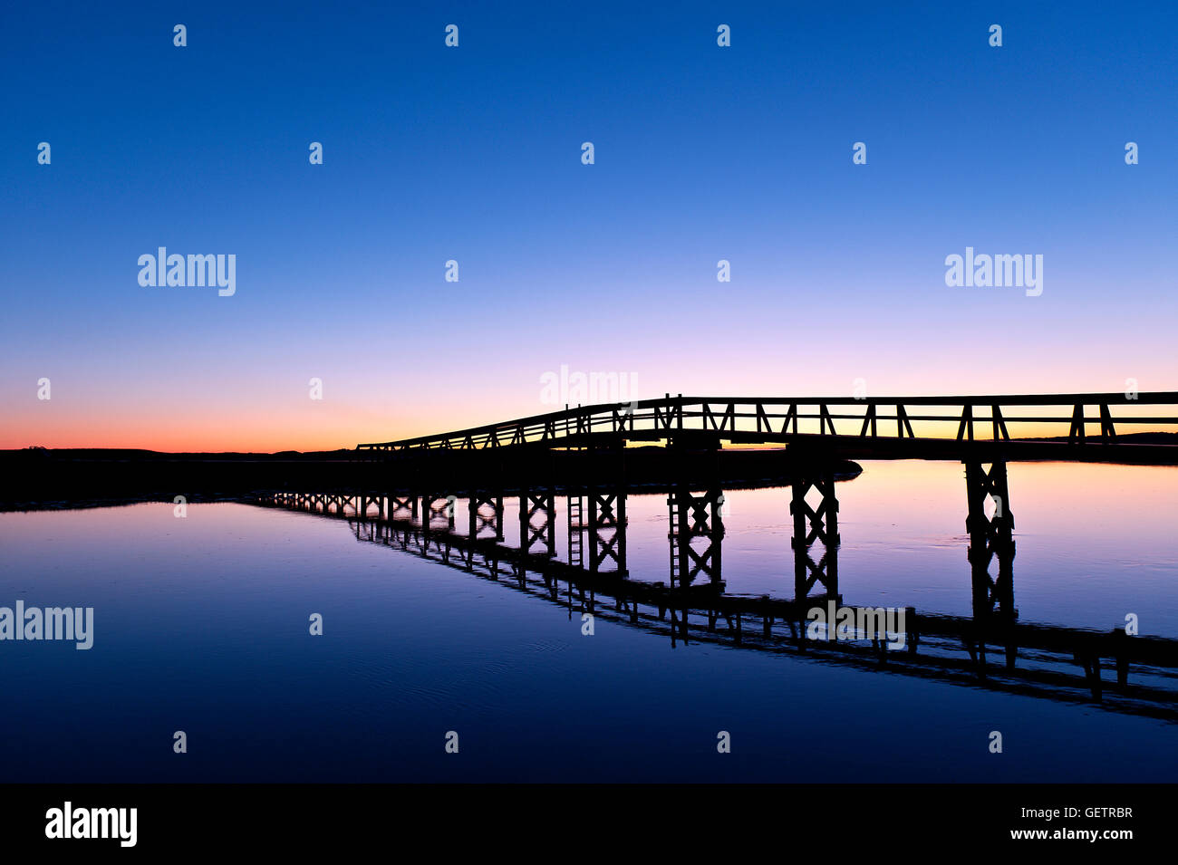 Boardwalk extending over the salt pond and marsh to the beach Stock ...