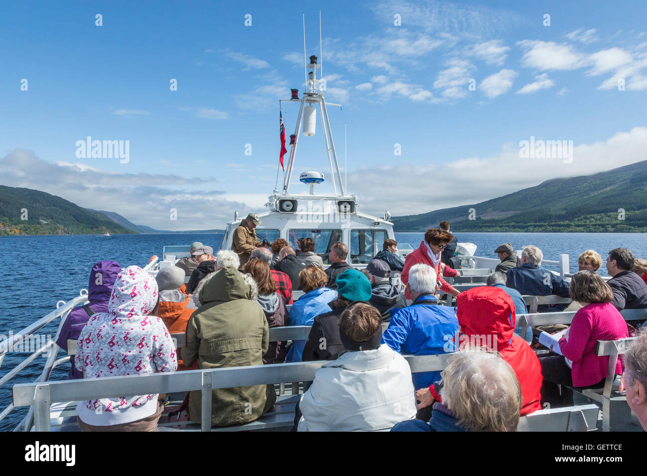 Tourists on Loch Ness cruise boat in Scotland Stock Photo - Alamy