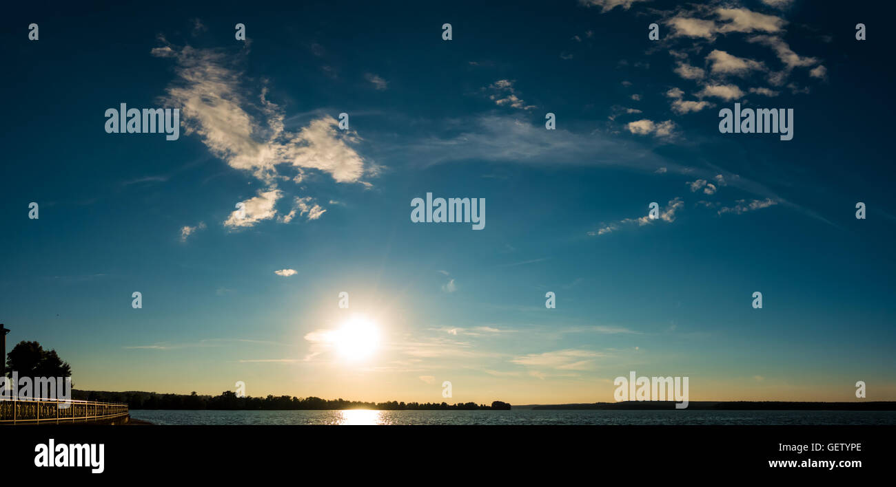 Panorama of sunset in lake Stock Photo - Alamy