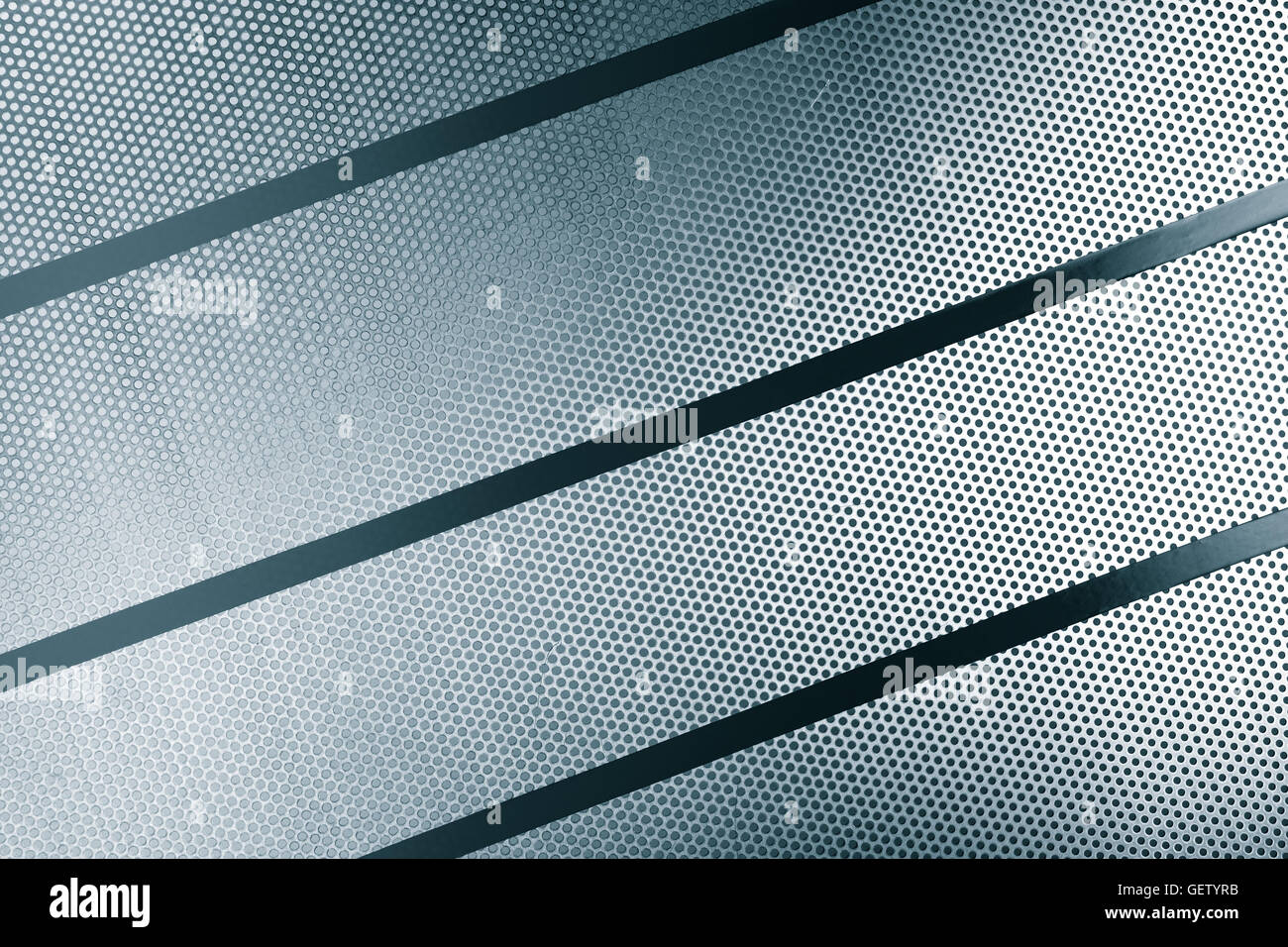 Perforated metal sheet background Stock Photo - Alamy