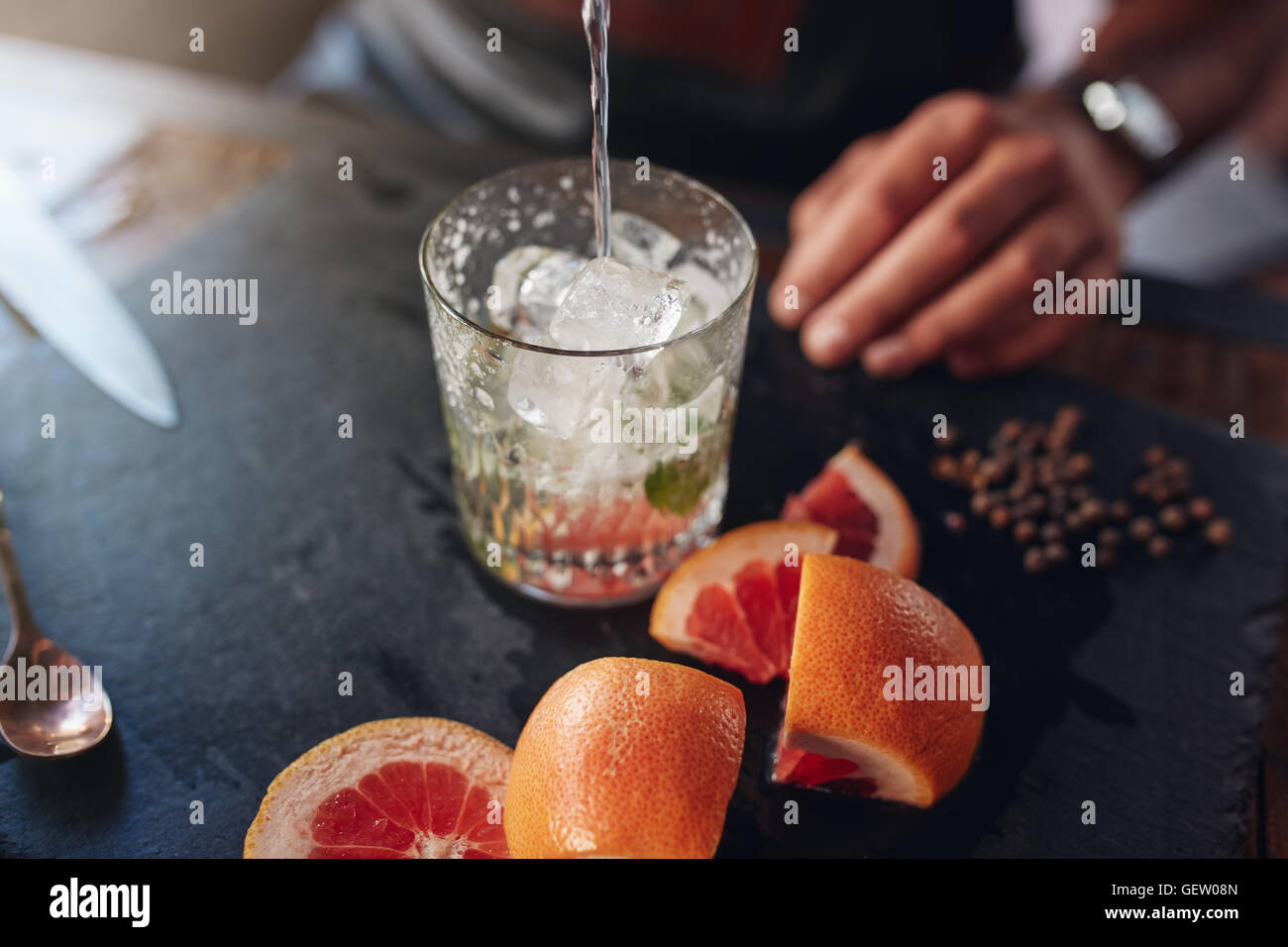 Bartender pouring cocktail hi-res stock photography and images - Alamy