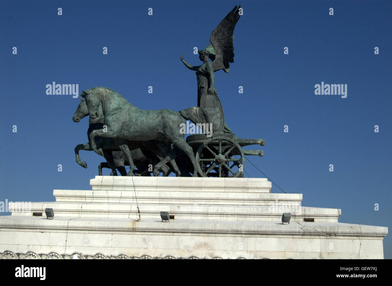 The goddess Victoria and quadriga dell'Unità statue at the top of the ...
