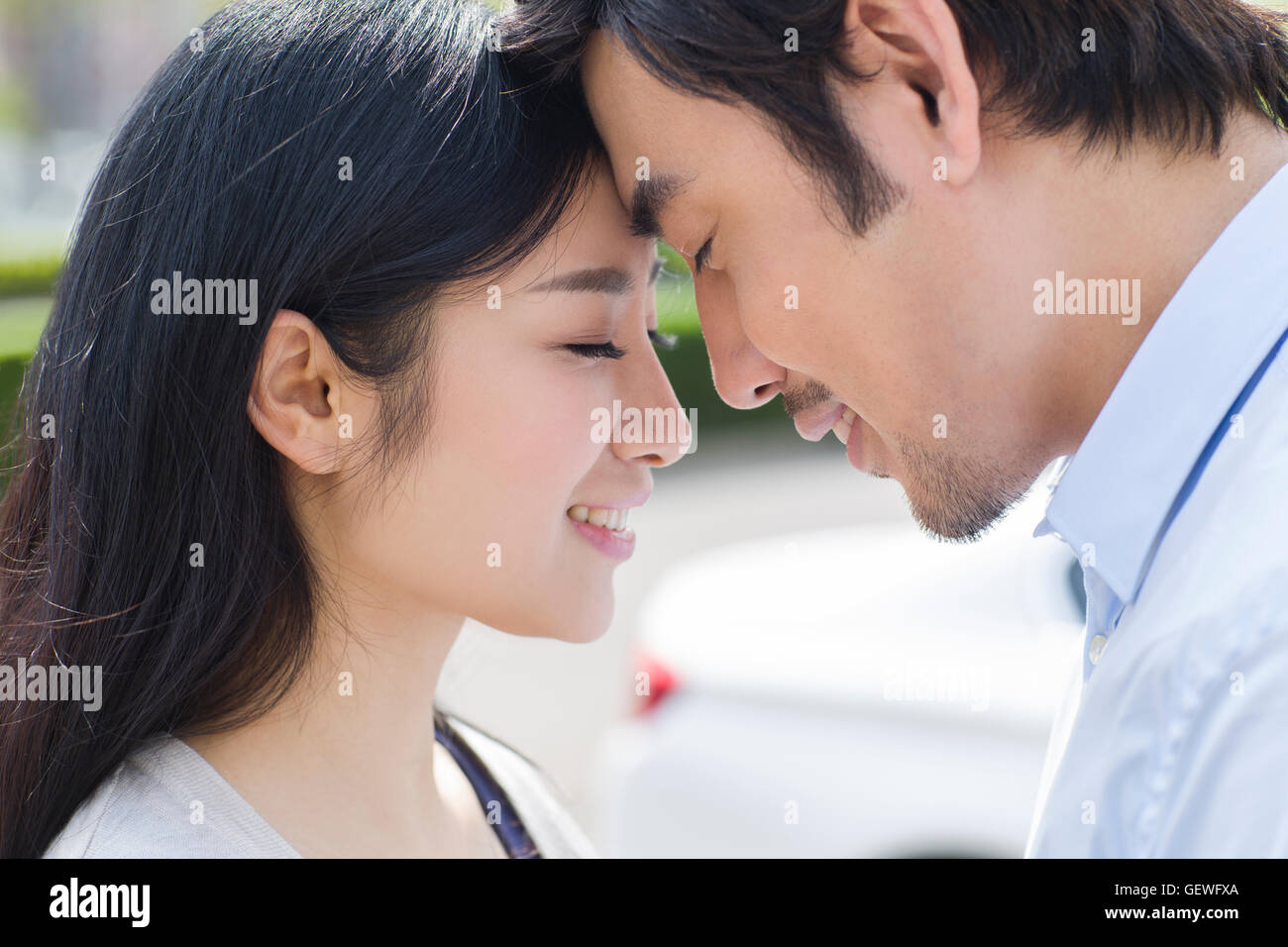 Happy young Chinese couple Stock Photo - Alamy