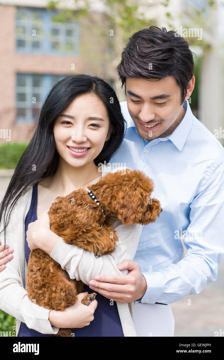 Couple with pet asian ethnicity hi-res stock photography and images - Alamy