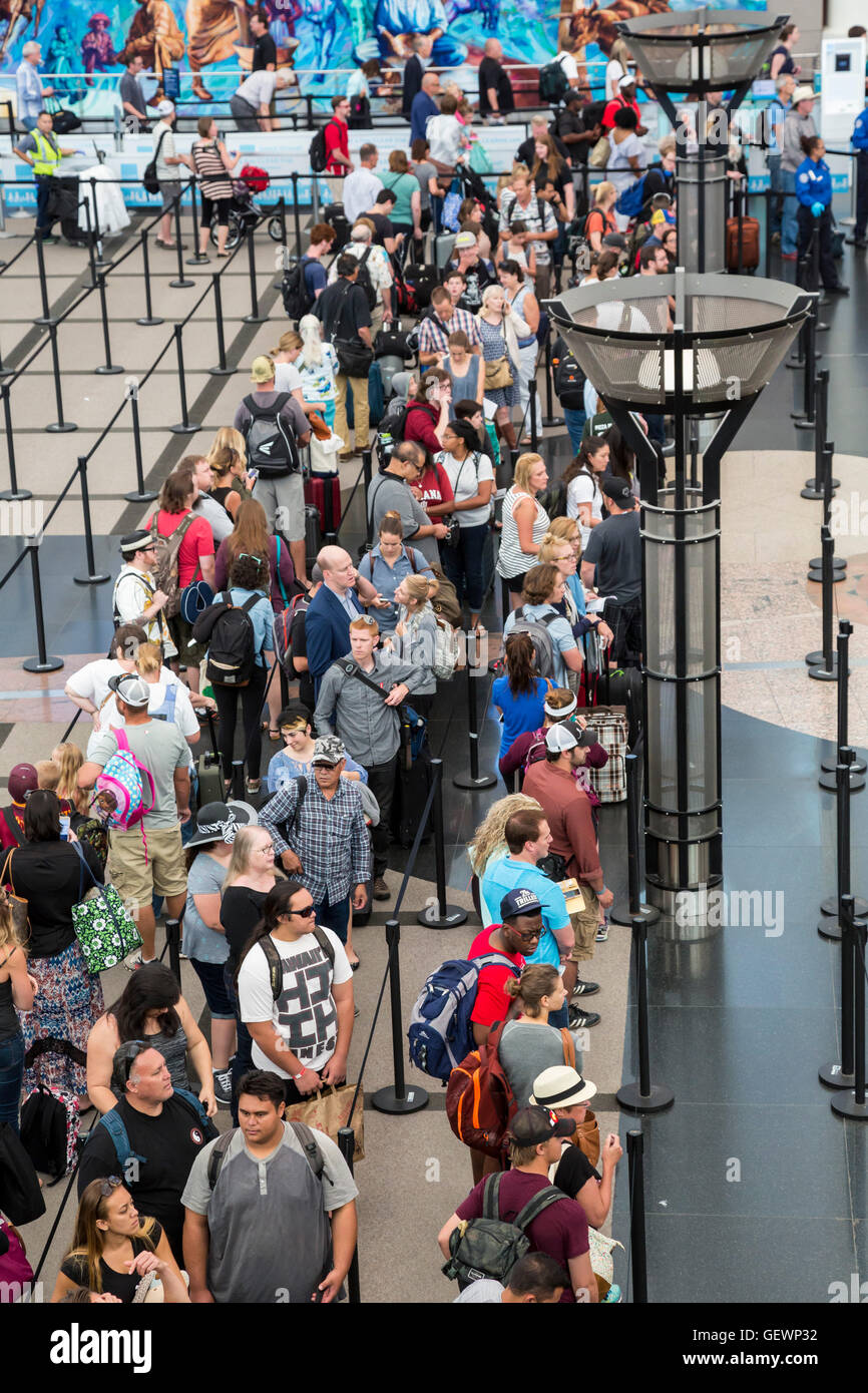 Denver, Colorado - Passengers wait for security screening at Denver ...