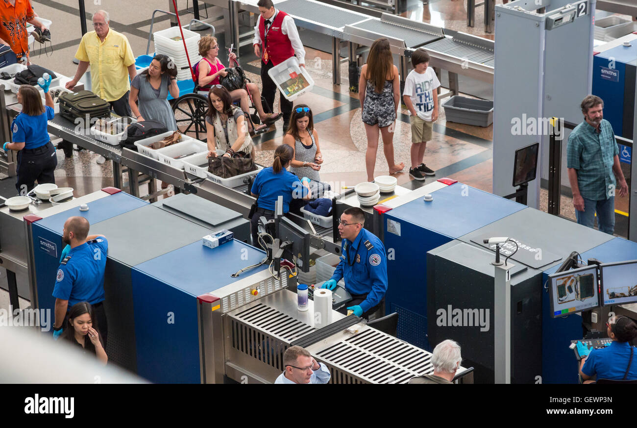 Security working hi-res stock photography and images - Alamy