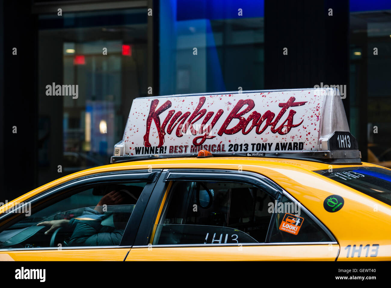 Detail of Yellow Cab with Kinky Boots advertising sign Stock Photo - Alamy