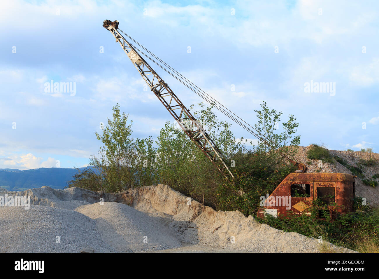 Quarry crane out of service. Industrial machinery. Mining Stock Photo ...
