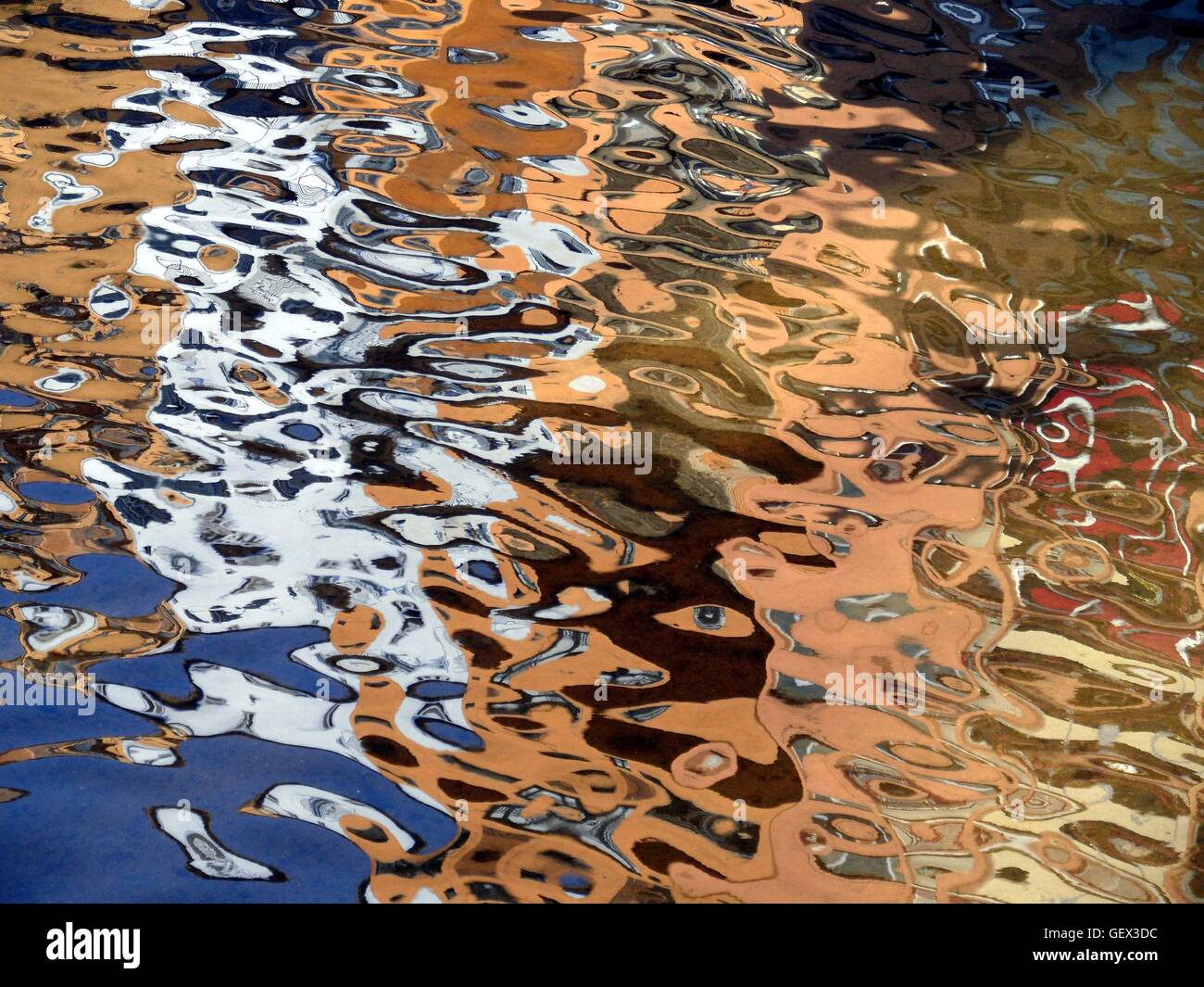 Reflection of colorful houses in a river Stock Photo - Alamy