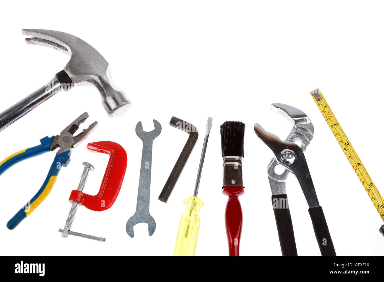Assortment of tools on plain background Stock Photo - Alamy