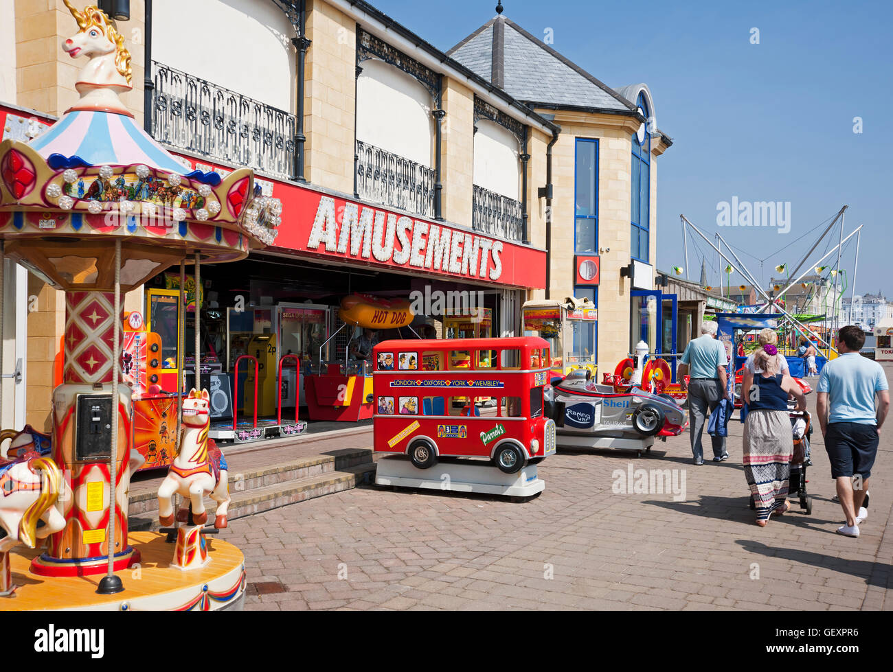 Amusements on the seafront Stock Photo - Alamy