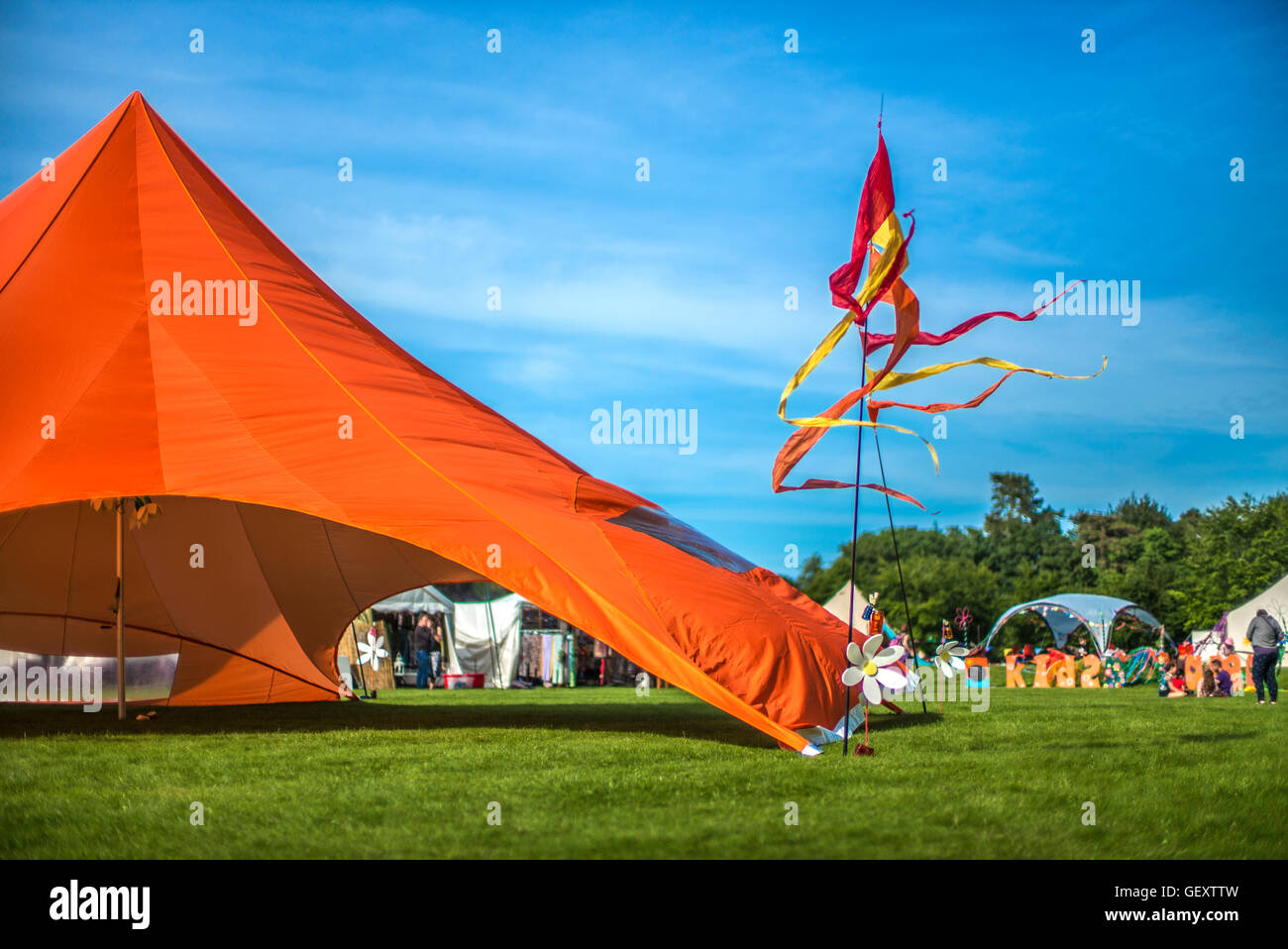A brightly coloured tent at the Colourfest Festival at St Giles House ...