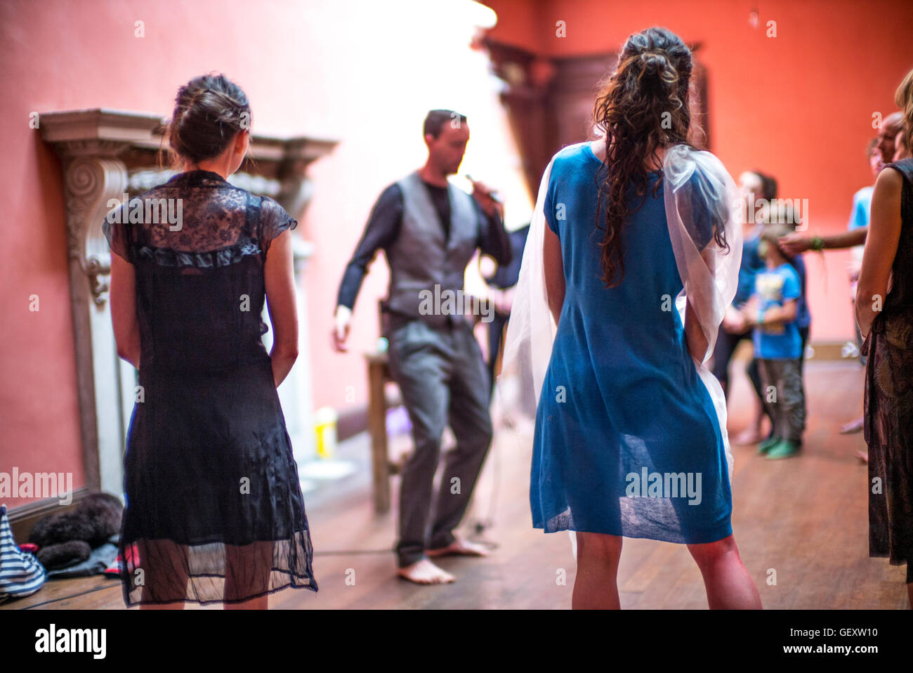 People attending a workshop inside the main house at the Colourfest ...