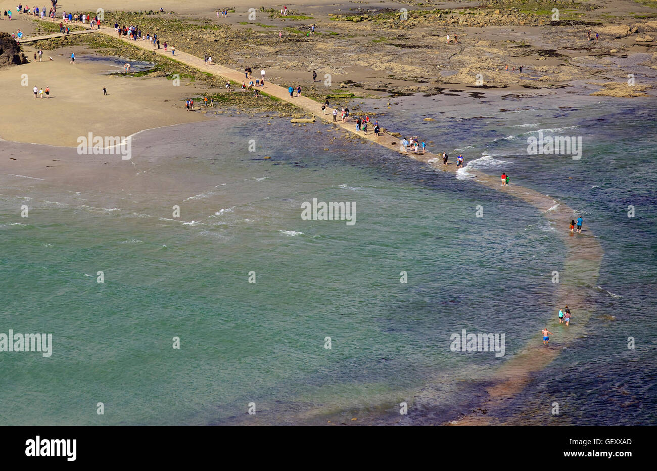 People crossing the tidal causeway from St Michael's Mount to Marazion ...