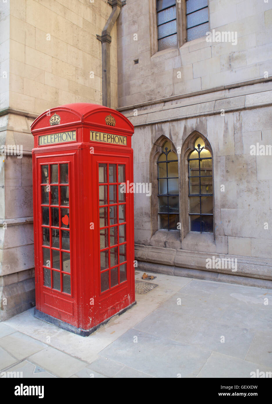 Red telephone booth designed by Sir Giles Gilbert Scott in Fleet Street ...