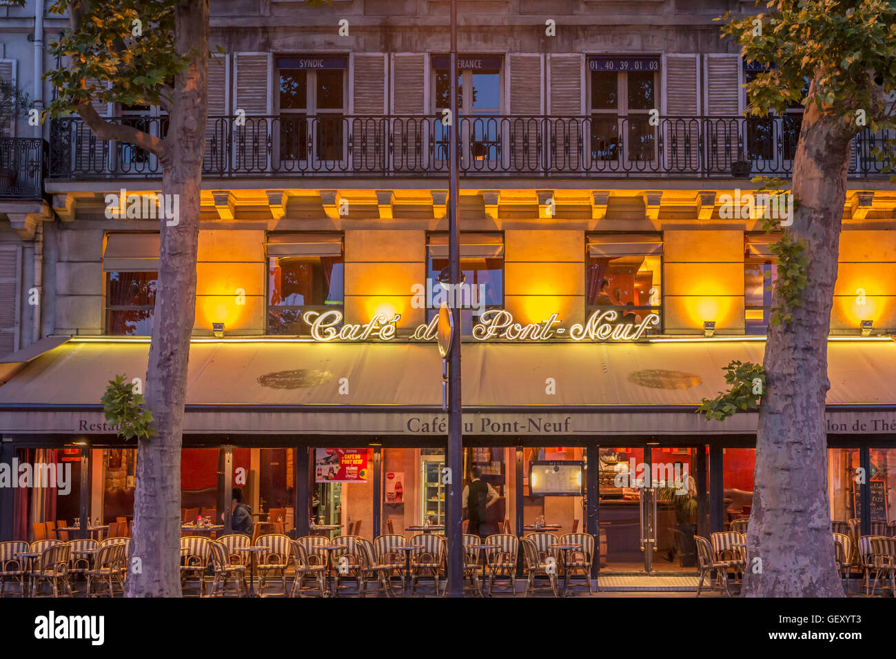 A view of Cafe du Pont Neuf in Paris at dusk Stock Photo - Alamy