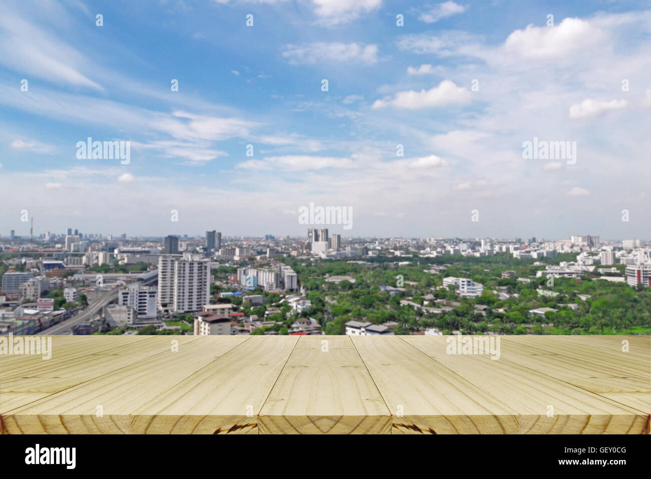 Window view with blurred cityscape and blue sky Stock Photo - Alamy