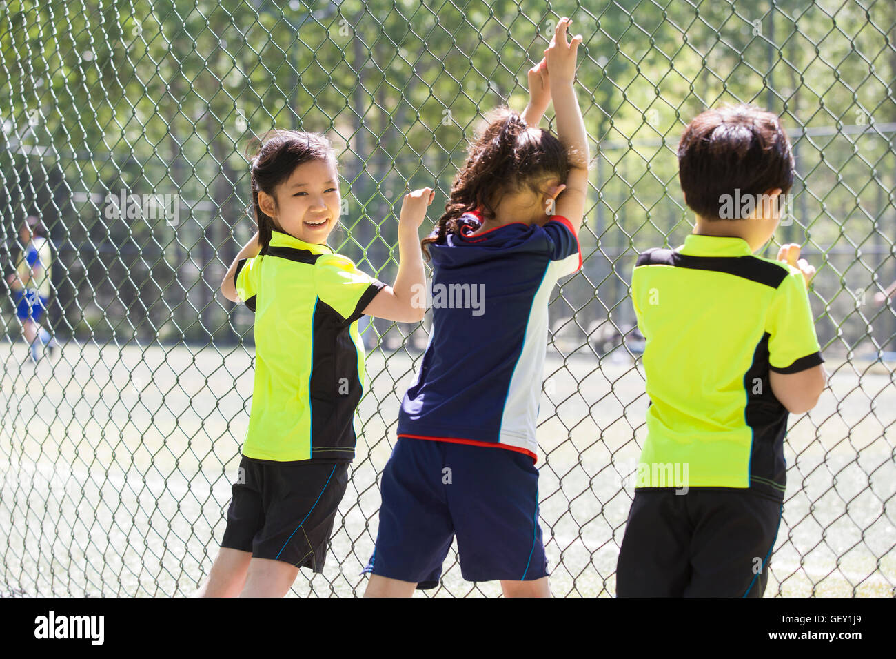 Rear view of Chinese children in sportswear Stock Photo - Alamy
