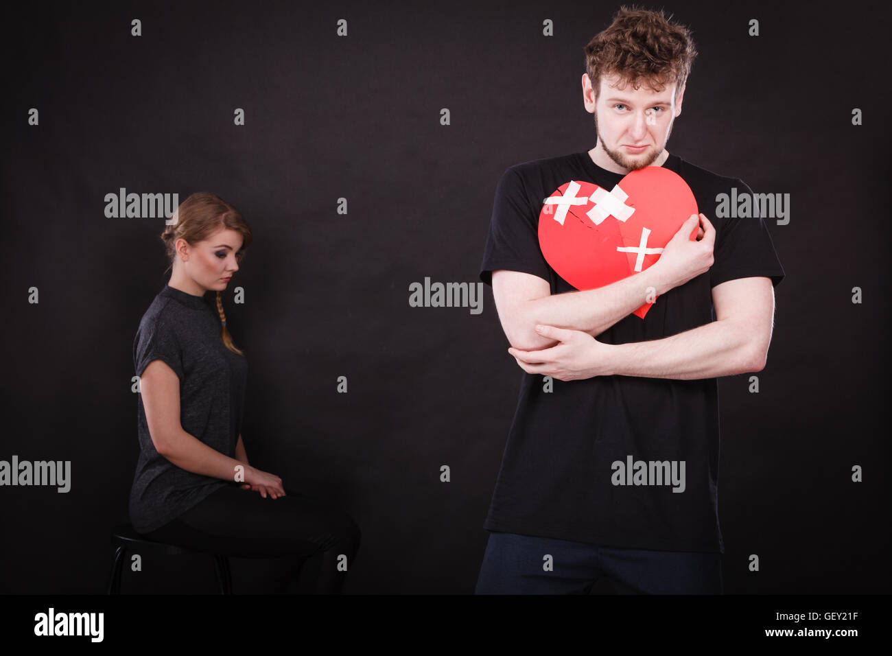 Broken heart difficult love concept. Sad unhappy couple woman and man ...