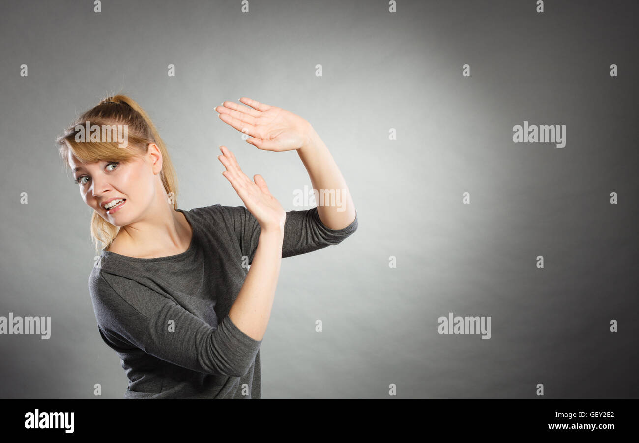 Fear and scare. Violence against woman. Concept of threating young ...