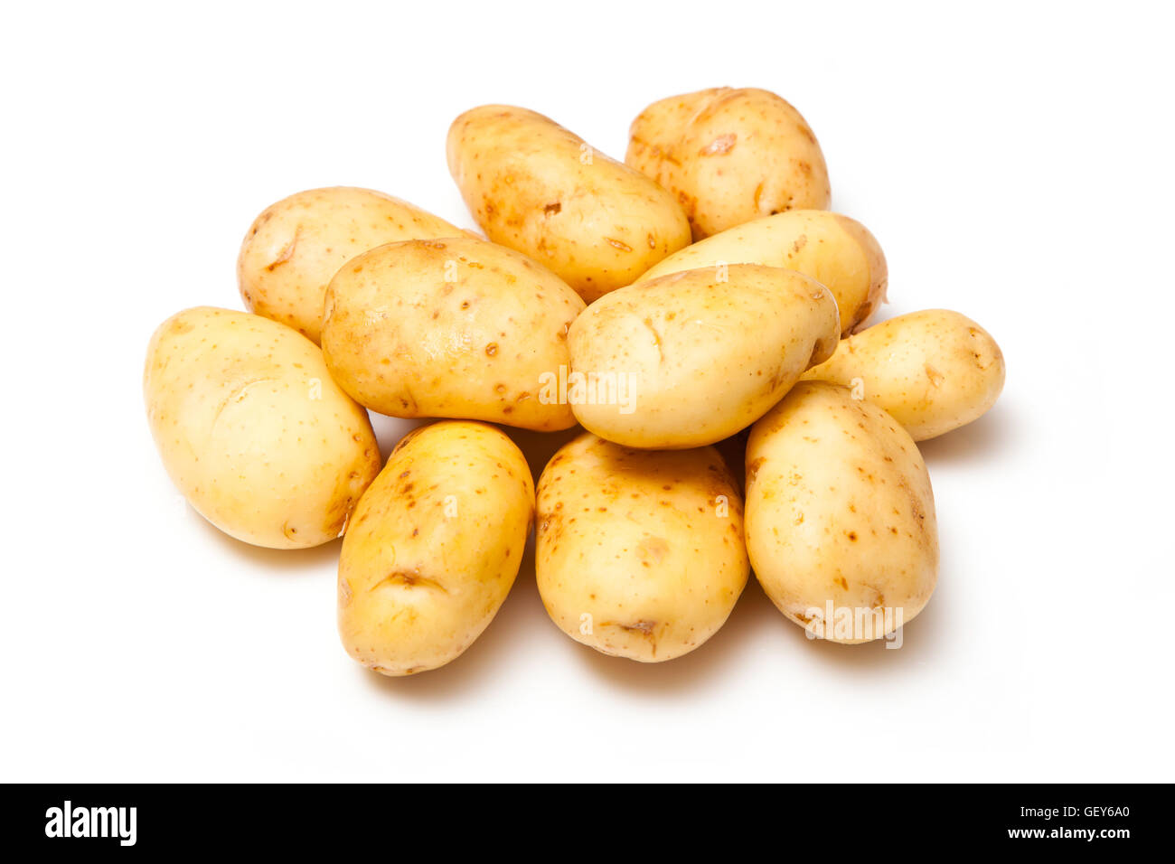 White potatoes isolated on a white studio background Stock Photo - Alamy