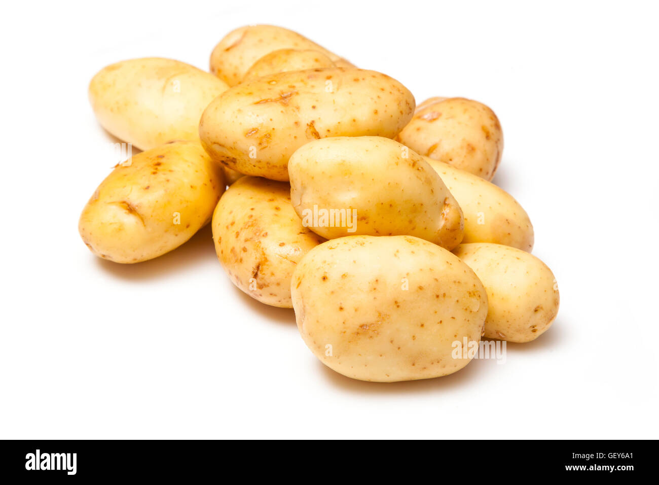 White potatoes isolated on a white studio background Stock Photo - Alamy