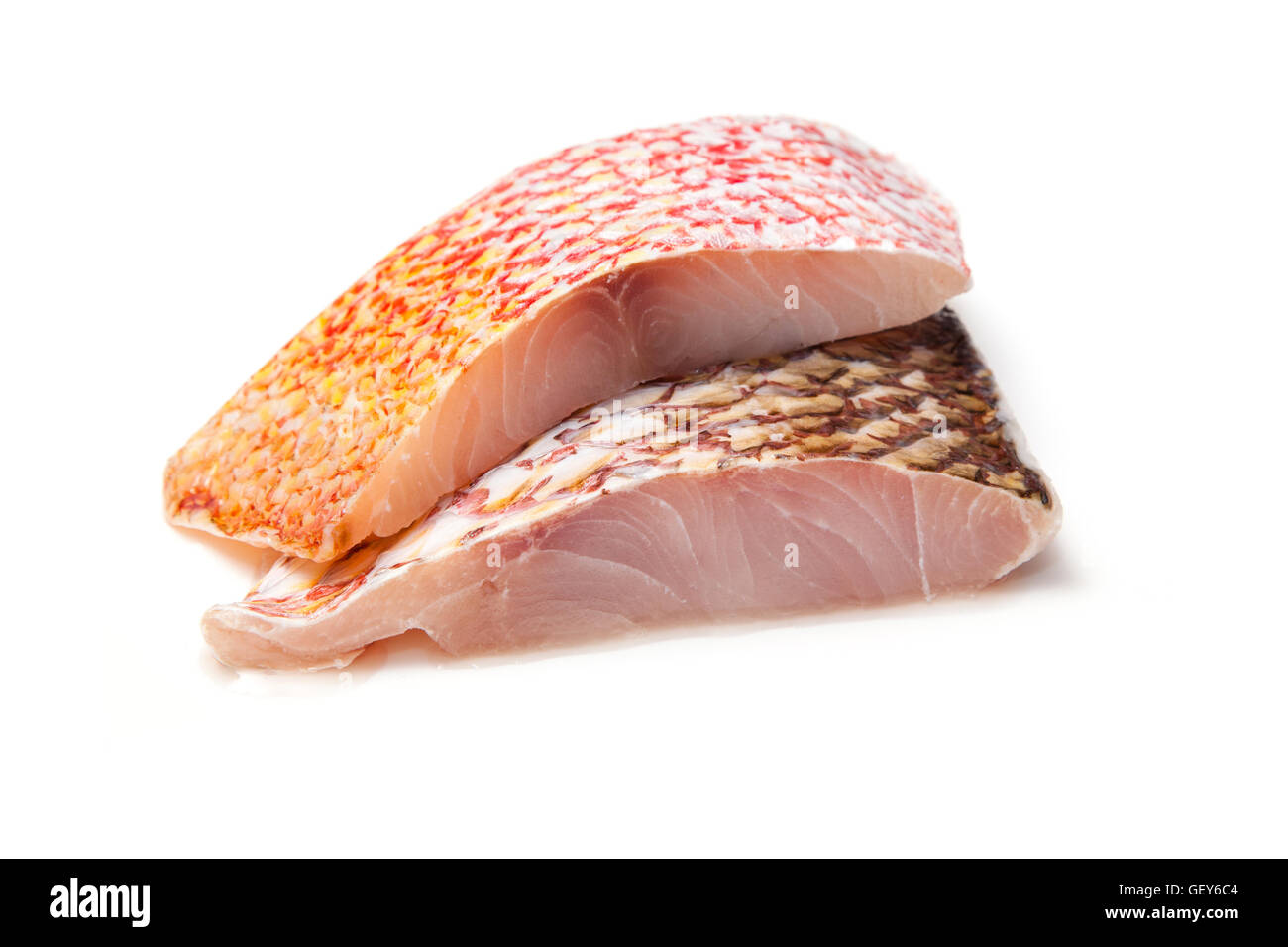 Raw Red Snapper fish fillets isolated on a white studio background ...