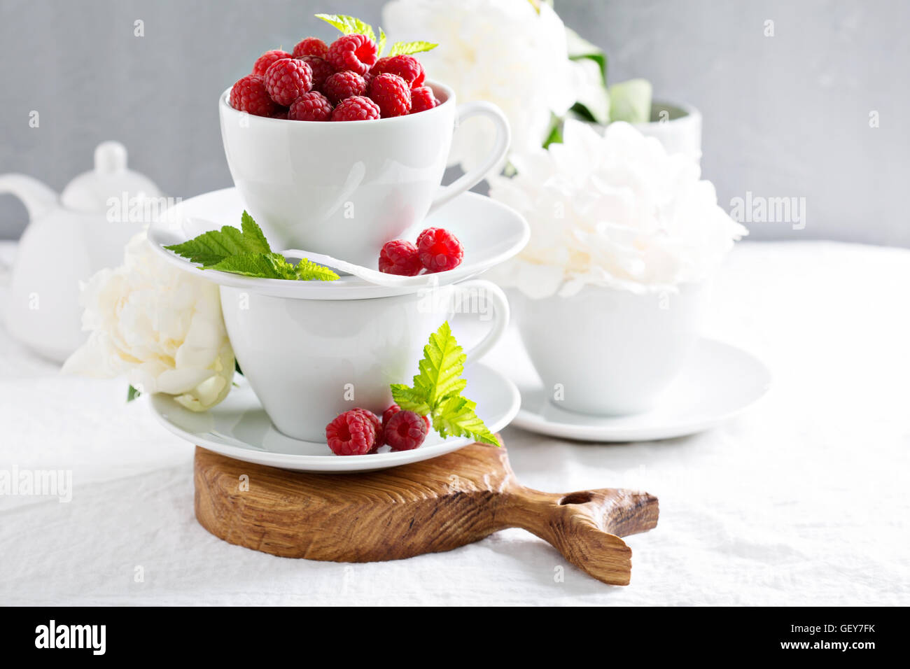 Fresh raspberries in stacked cups Stock Photo - Alamy