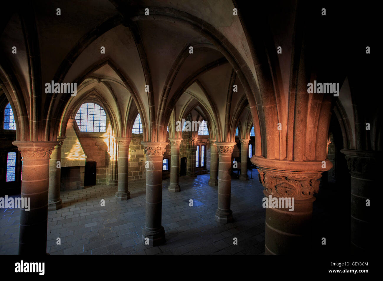 Intricately carved rooves and columns inside the Mont San Michel ...