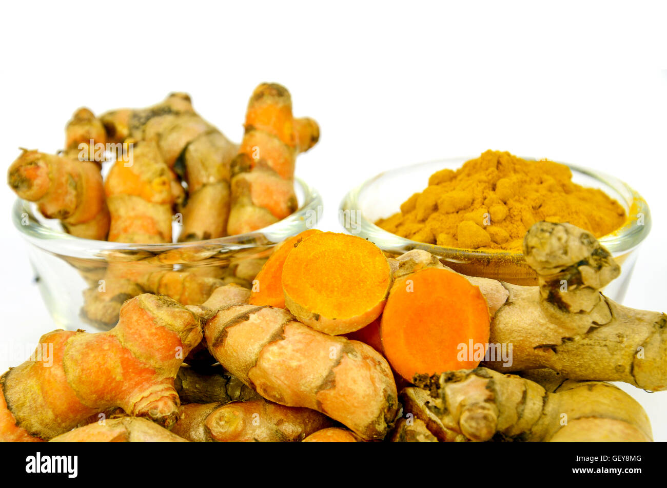 Turmeric (Curcuma longa L.) root and turmeric powder on white ...
