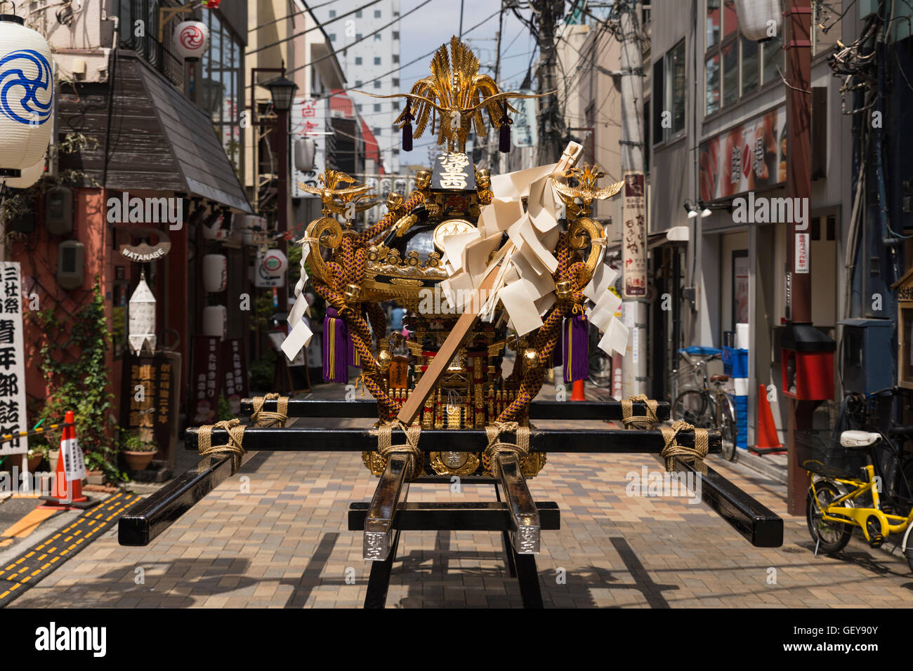 Close view on one of the portable shrines in a side street during the ...