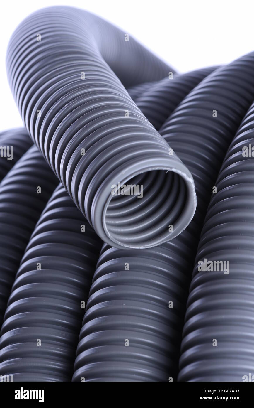 Corrugated pipe for installation of electrical cable isolated on white ...