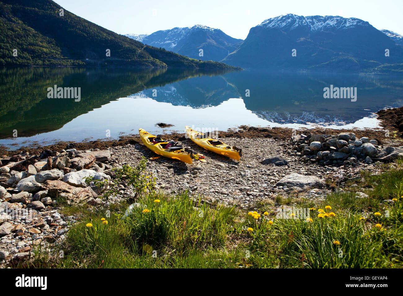 Kayaks on the bank of Luster Fjord in Sognefjorden, Norway Stock Photo ...