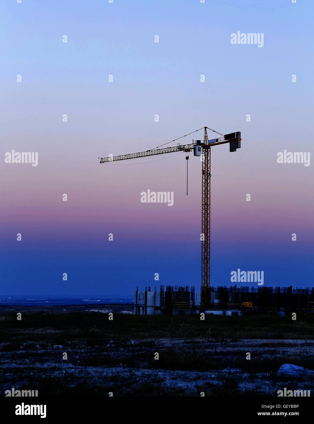 Sunset background construction crane hi-res stock photography and ...