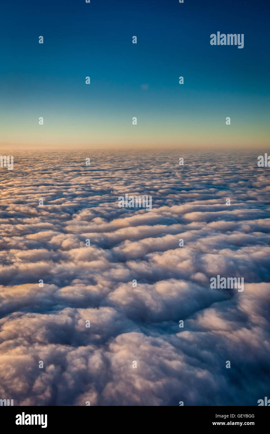 Vertical picture of clouds in the sky seen from above Stock Photo - Alamy