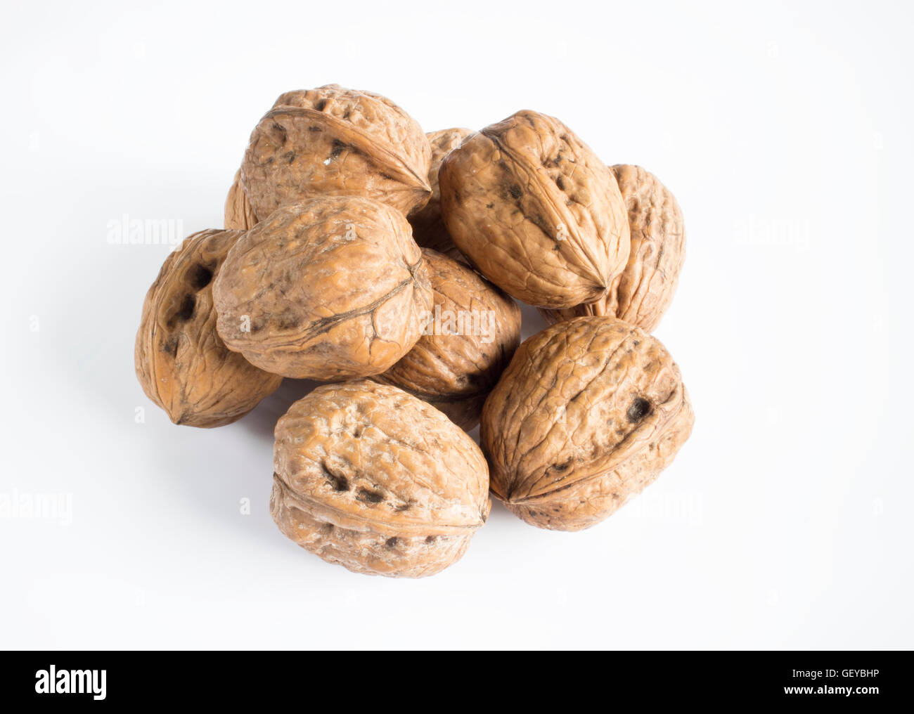 Assortment of nuts displayed on white background Stock Photo - Alamy