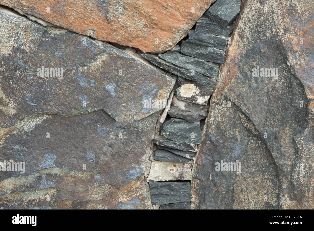 Rough stone rocky grunge background texture of a wall Stock Photo - Alamy