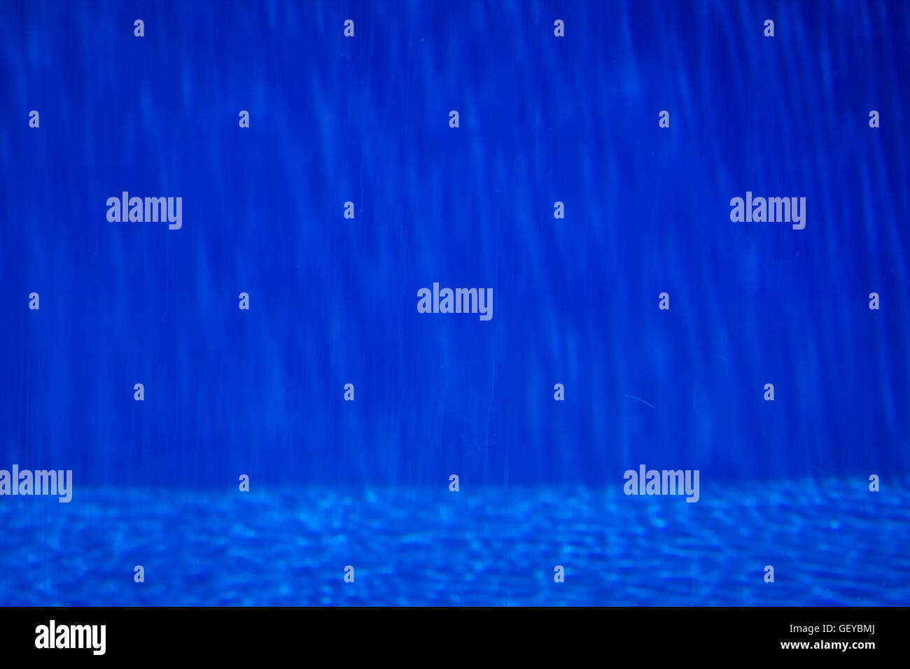 Deep blue water background of the swimming pool Stock Photo - Alamy