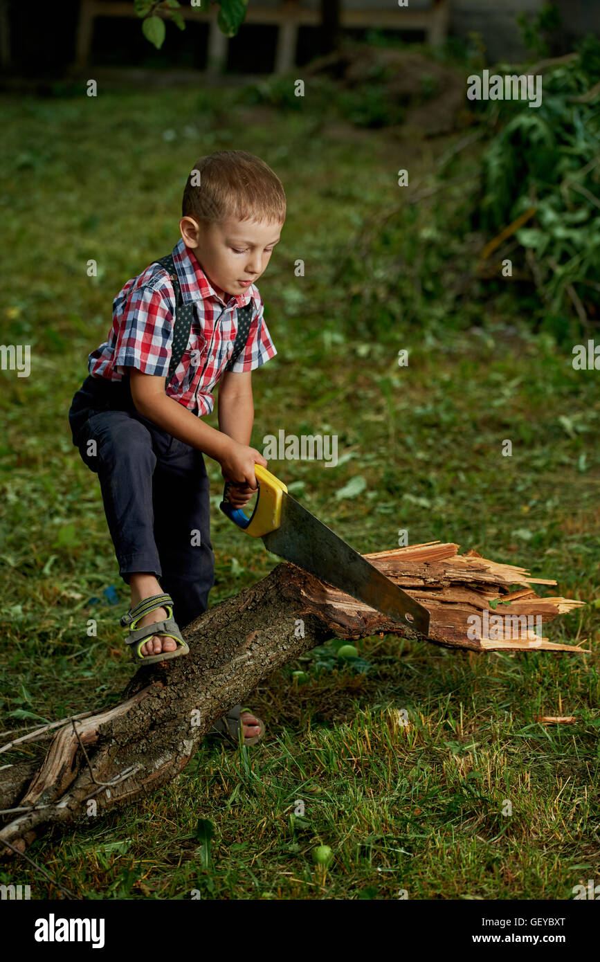 Sawing boy hi-res stock photography and images - Alamy