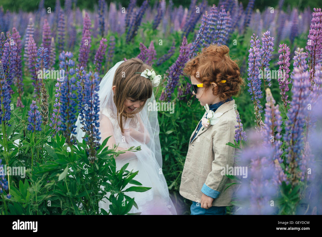 two funny little bride and groom Stock Photo - Alamy