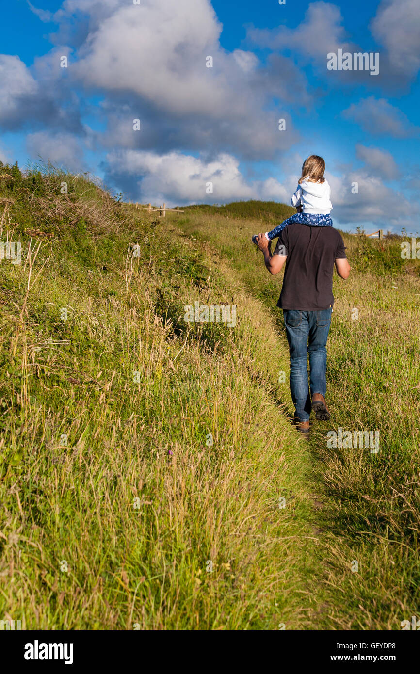 Father giving daughter shoulder ride hi-res stock photography and ...