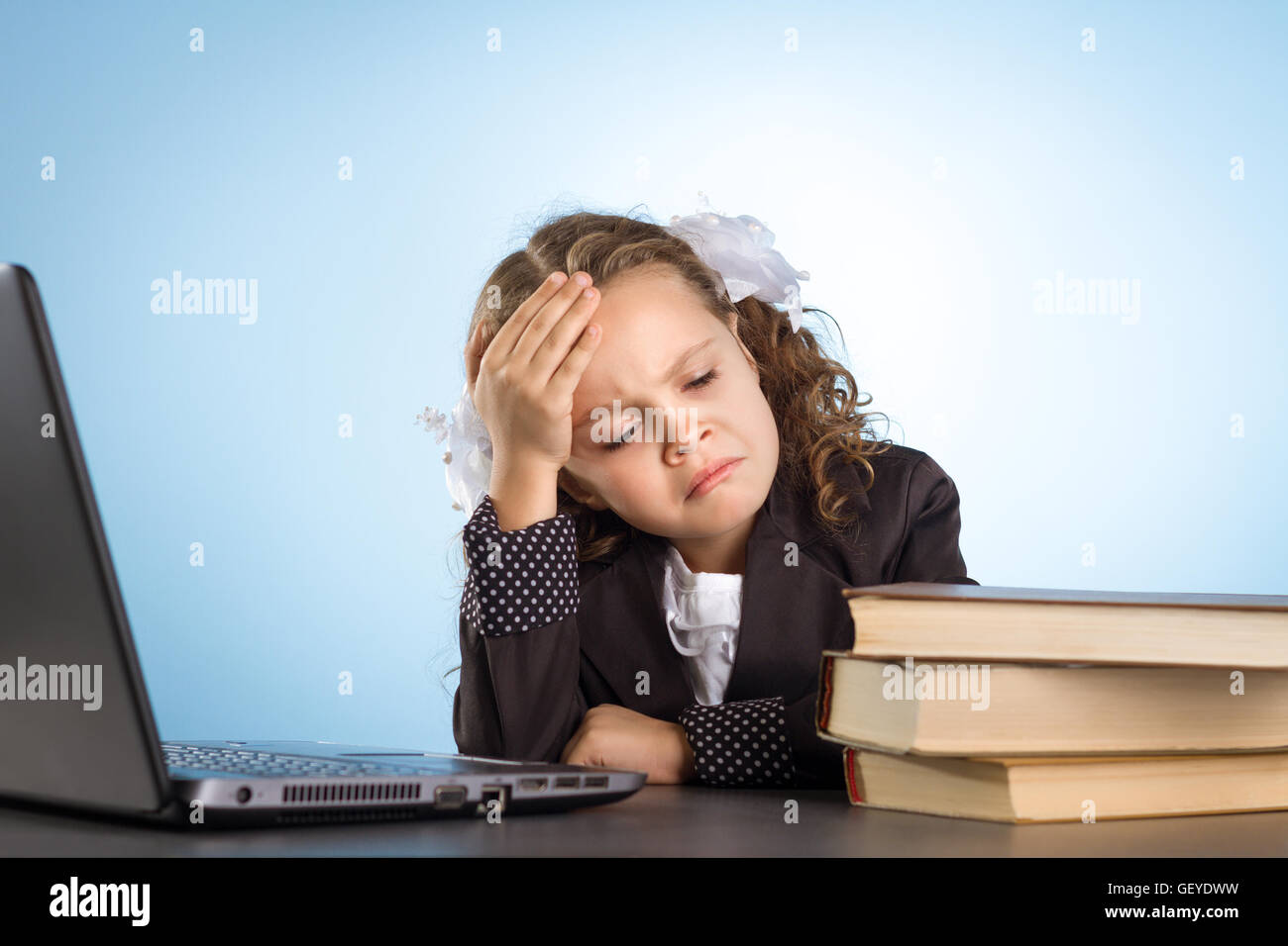 Sad Little Schoolgirl. School Theme Stock Photo - Alamy