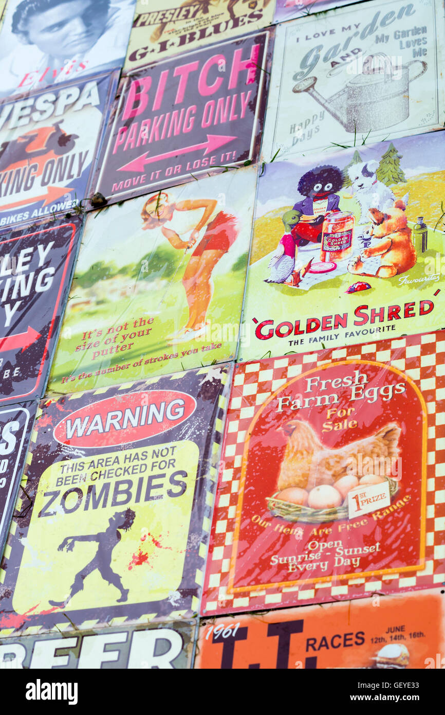 Nostalgic metal tin posters on display on stall at New Forest ...