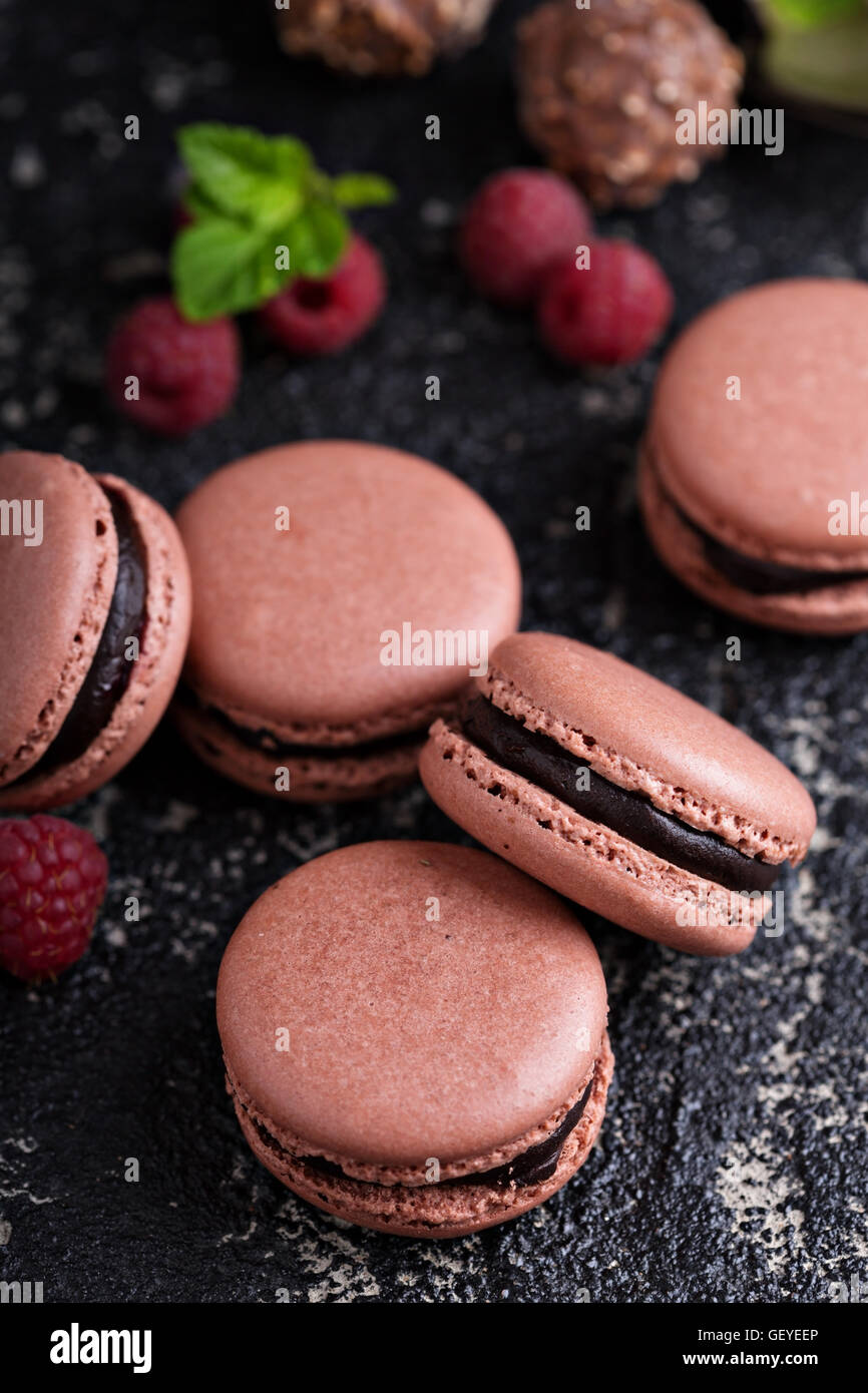 Chocolate and raspberry french macarons with ganache filling Stock ...